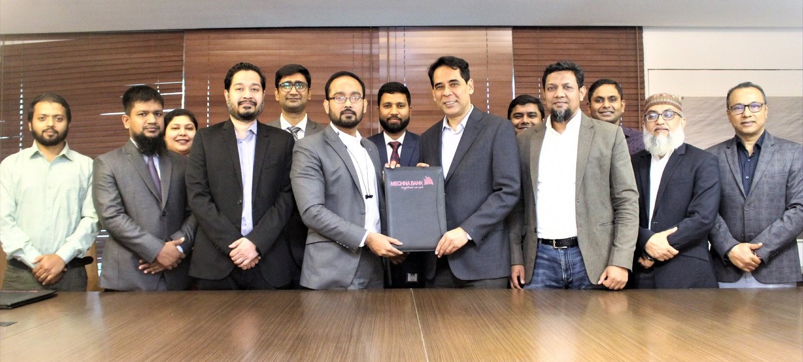 Meghna Bank PLC. Inks Corporate Agreement with Rangs Industries Limited ...